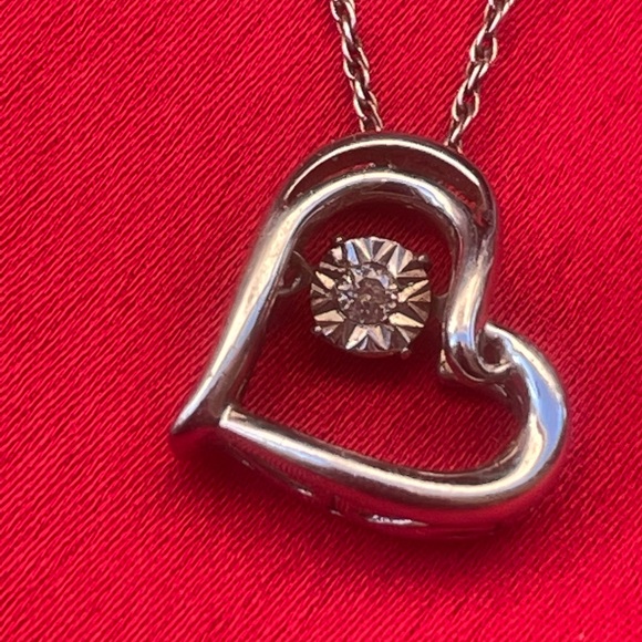 Zales | Jewelry | Zales Unstoppable Heart Tm 8 Heart With Spinning Tiny ...